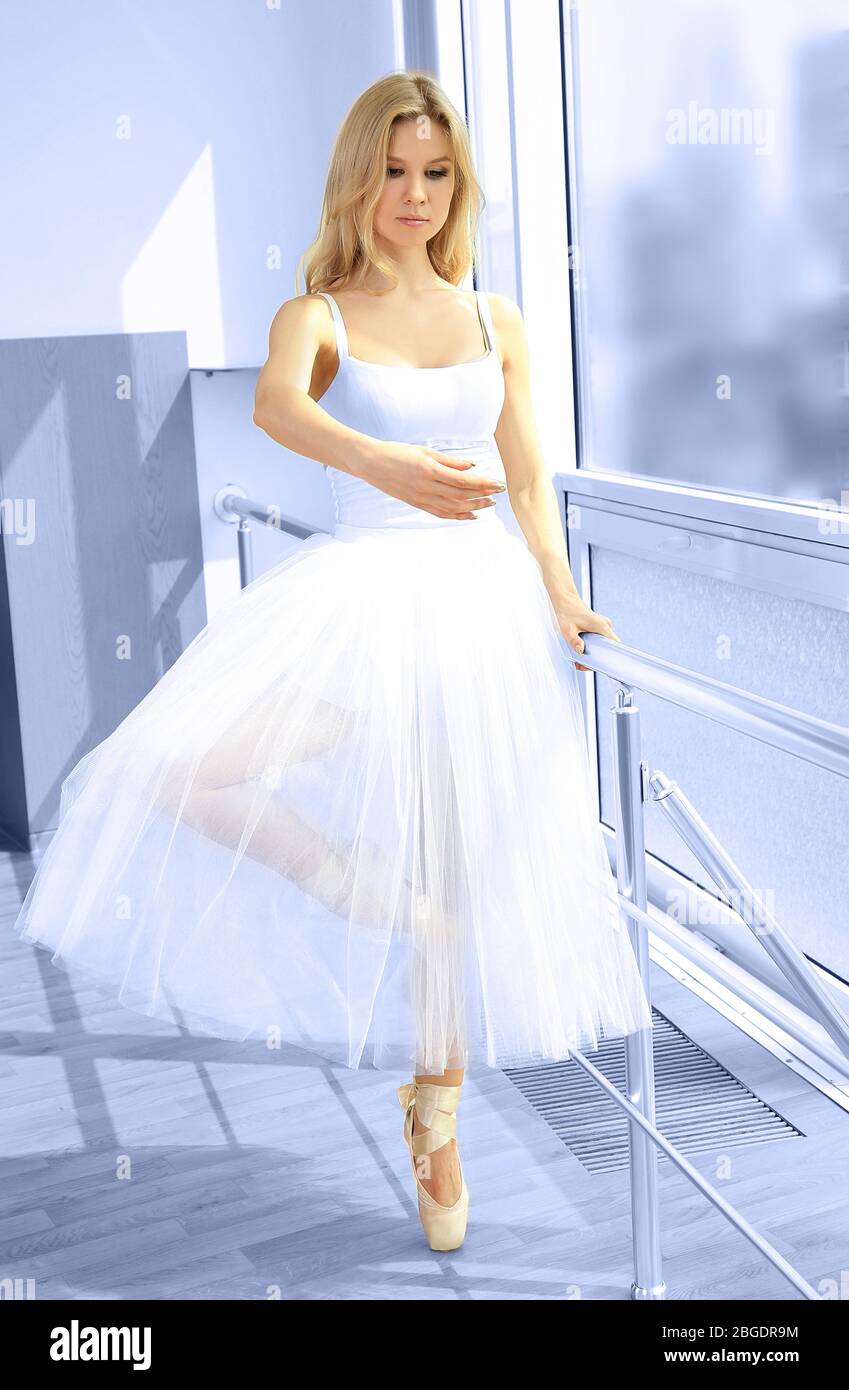 Beautiful balerina practicing in ballet class Stock Photo - Alamy