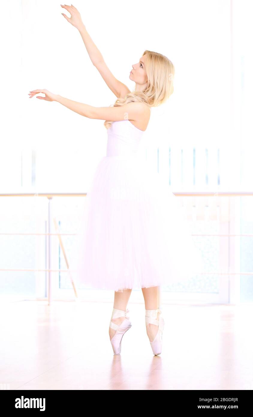 Beautiful balerina dancing in ballet class Stock Photo - Alamy