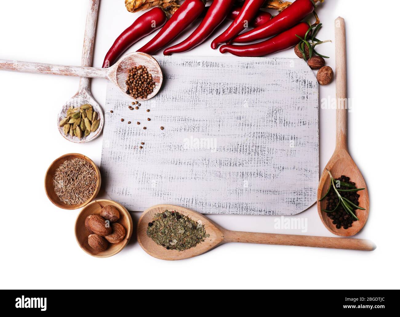 Different spices and cutting board, isolated on white Stock Photo - Alamy