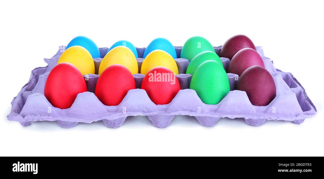 Colorful Easter eggs in tray isolated on white Stock Photo - Alamy
