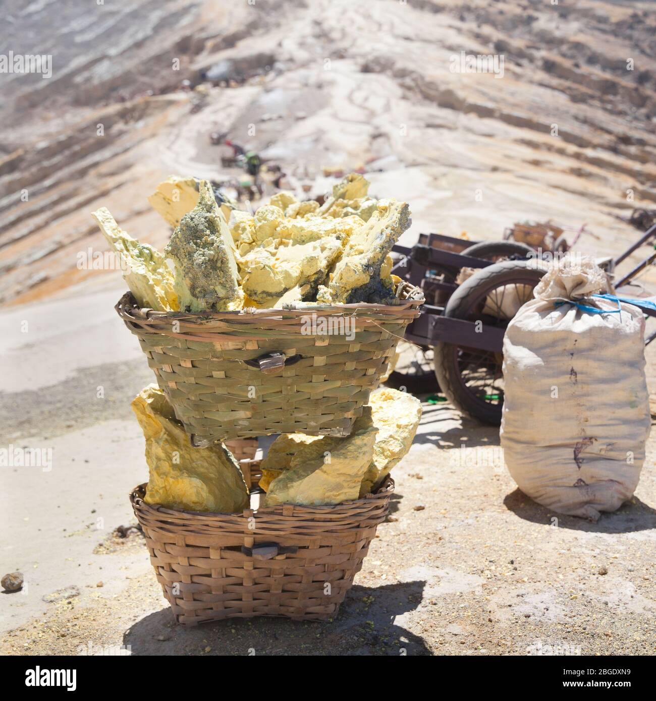 Heavy basket laden by pieces of natural sulfur to carry by miners from ...
