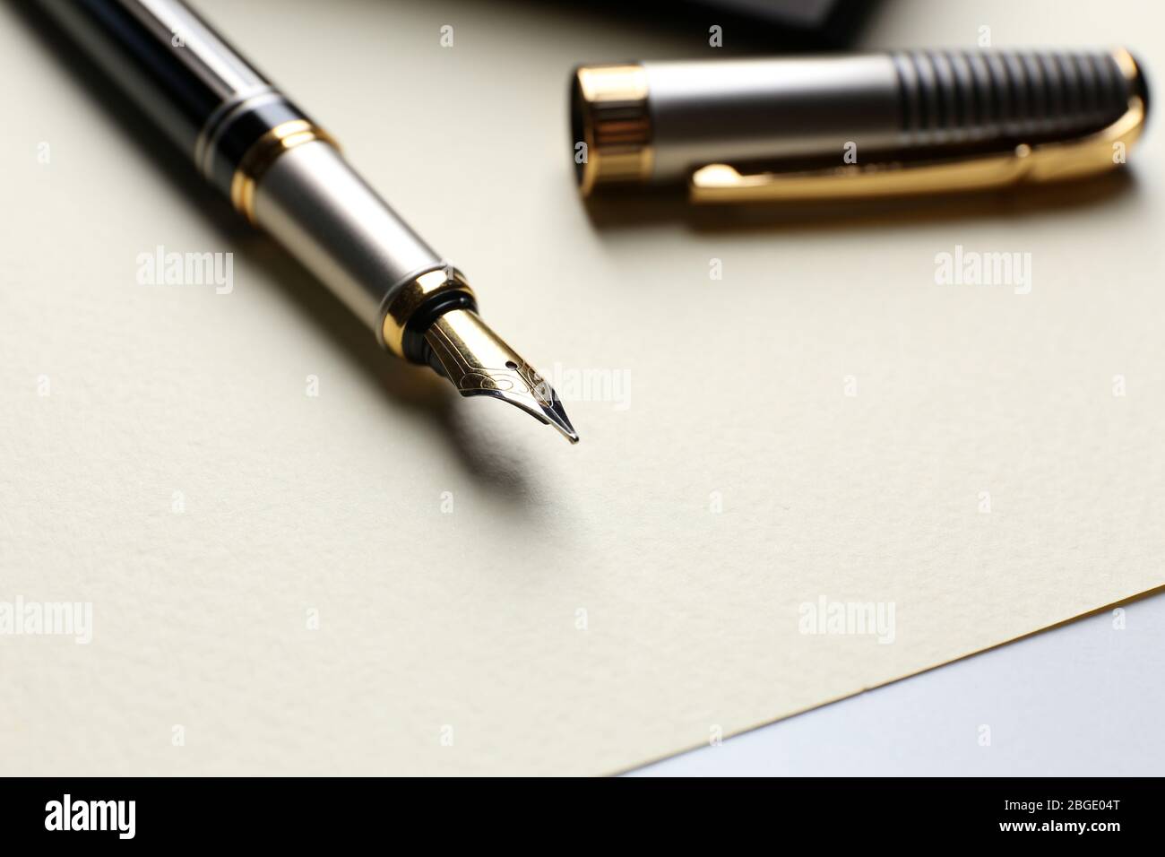 Pen and book, close up Stock Photo - Alamy
