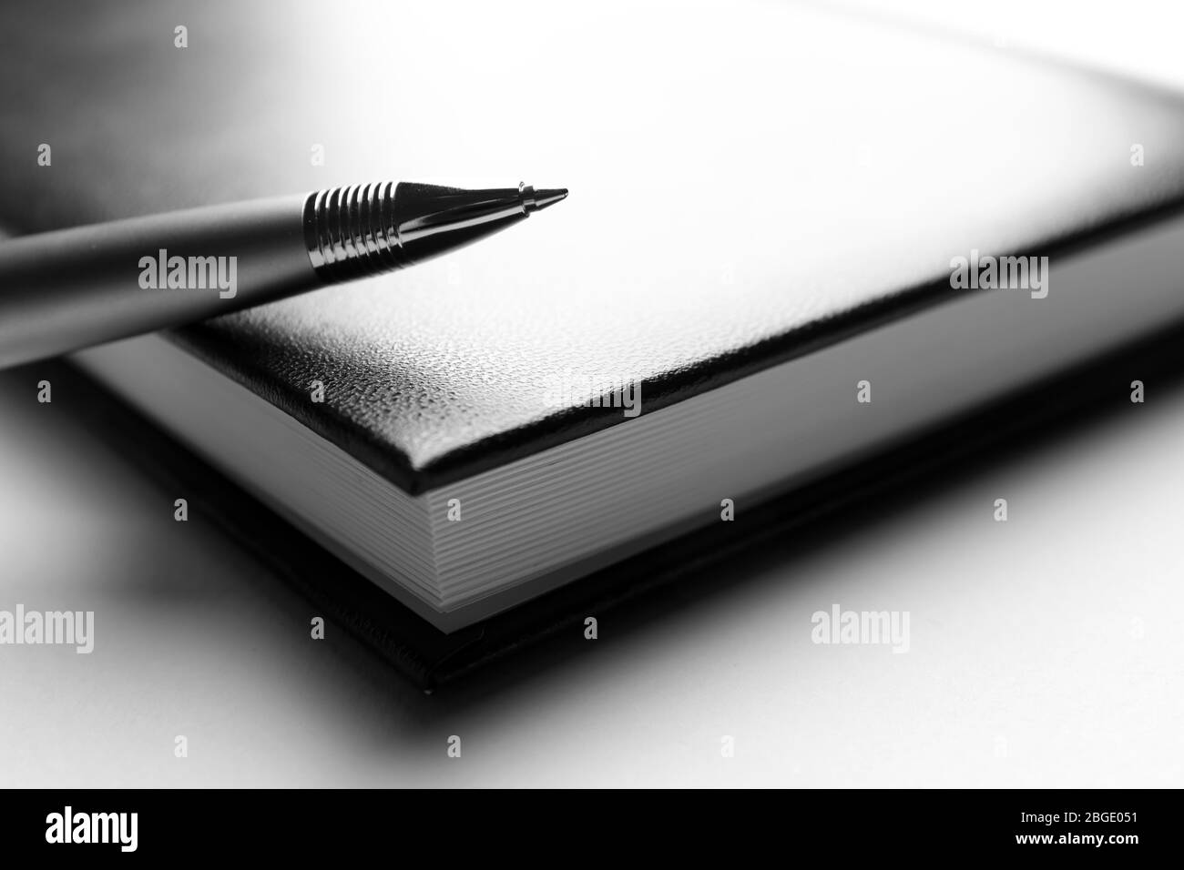 Black notebook book pen ballpen hi-res stock photography and images - Alamy