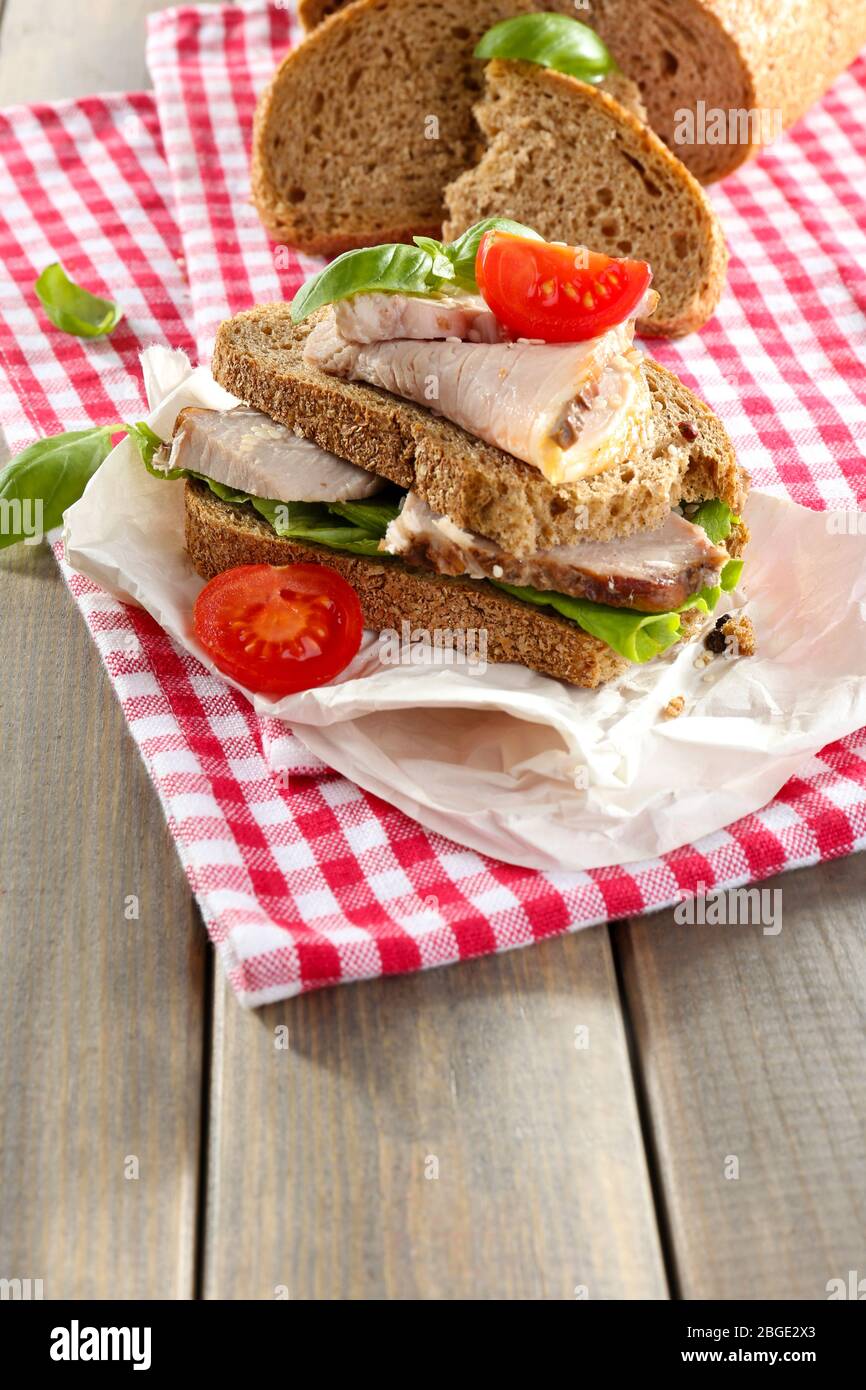 Delicious sandwiches with meet on table close-up Stock Photo - Alamy