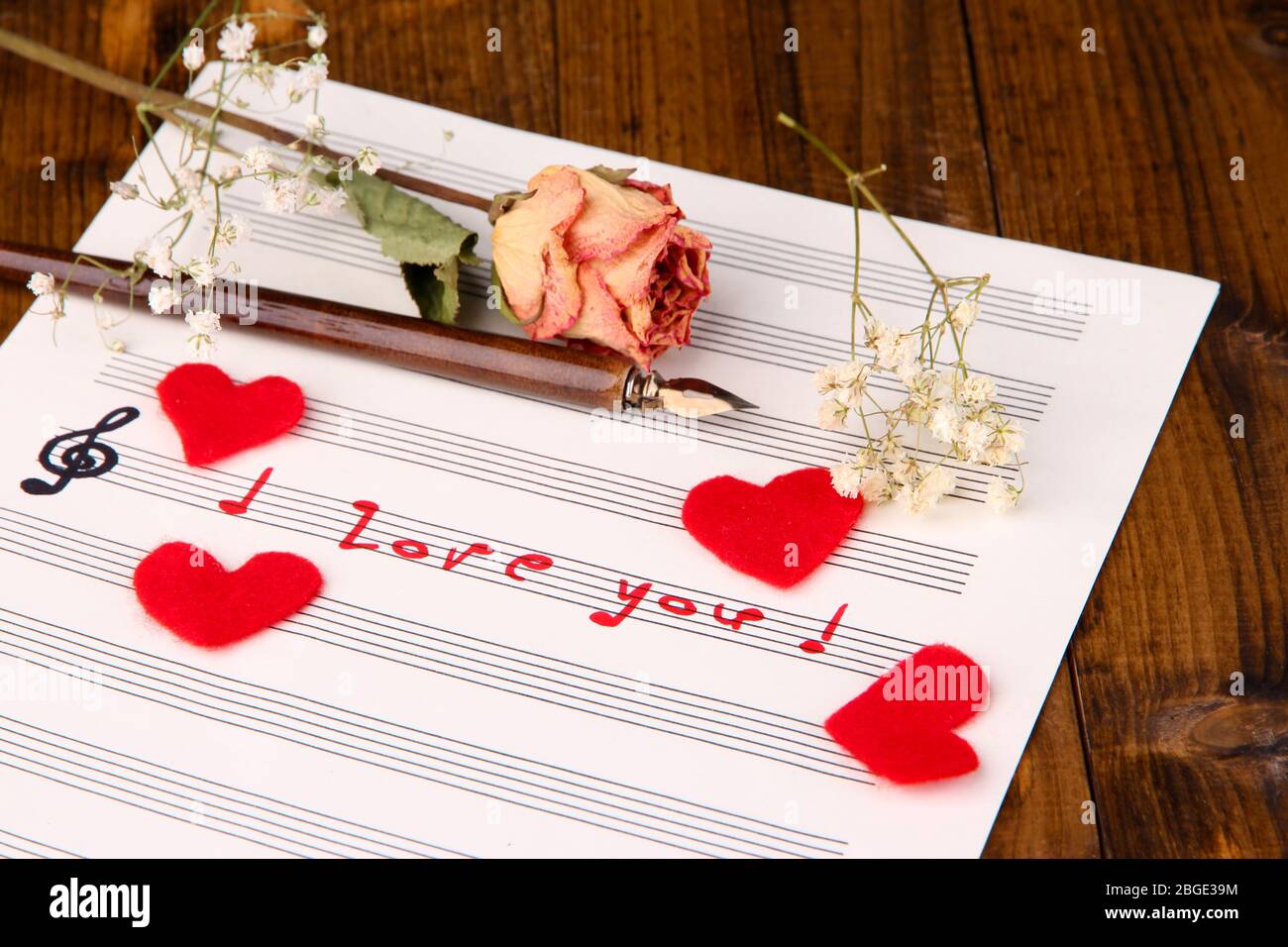 Music notes in music note book. Concept of love melody Stock Photo - Alamy