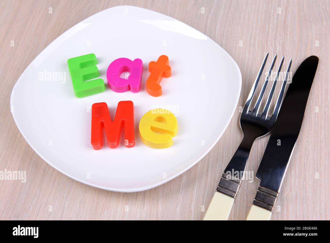 Plate with inscription on table close-up Stock Photo - Alamy