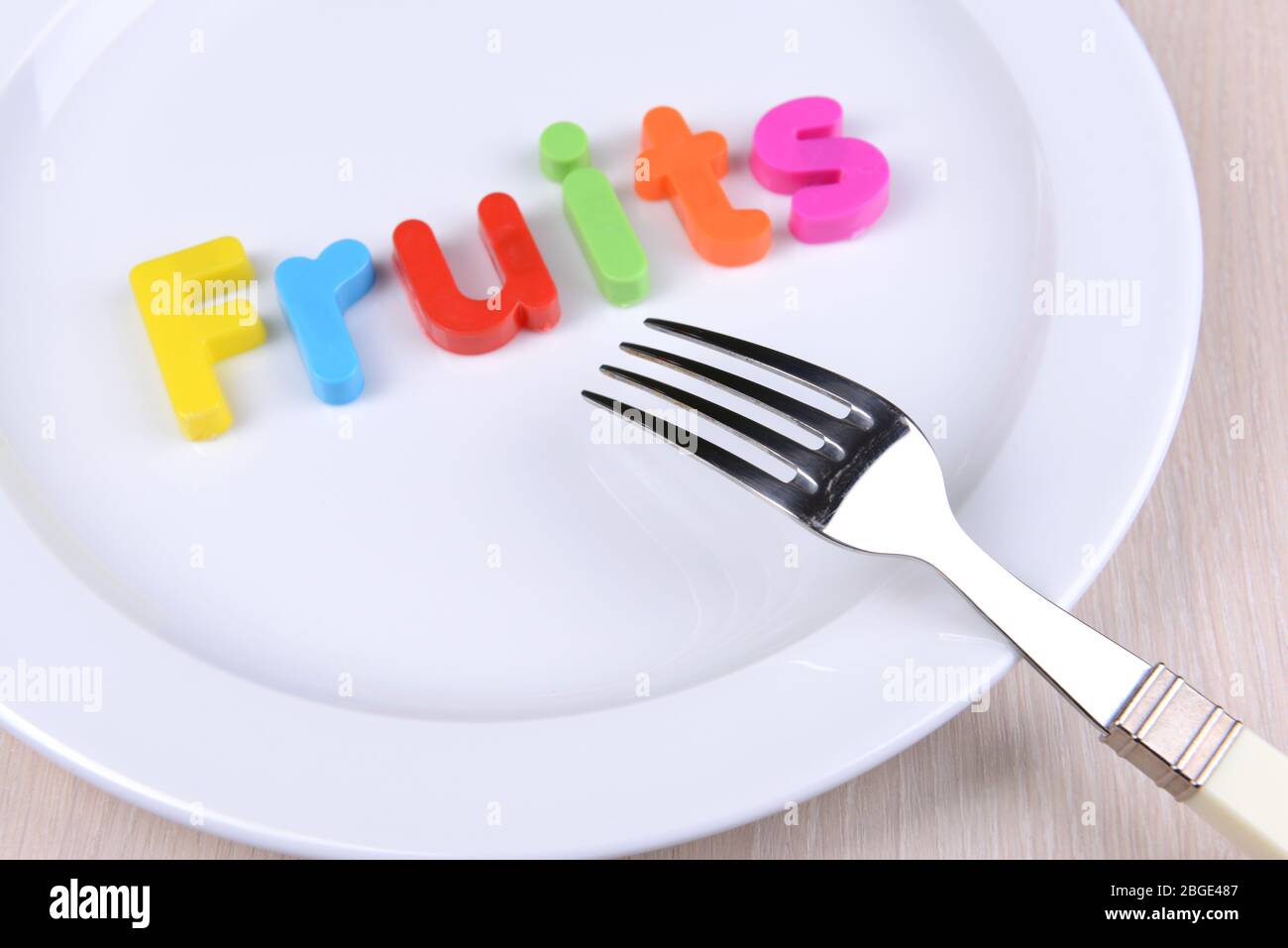 Plate with inscription on table close-up Stock Photo - Alamy