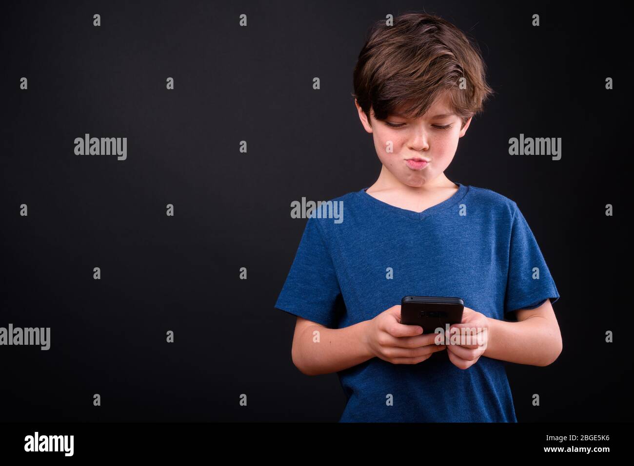 Young child using technology hi-res stock photography and images - Alamy