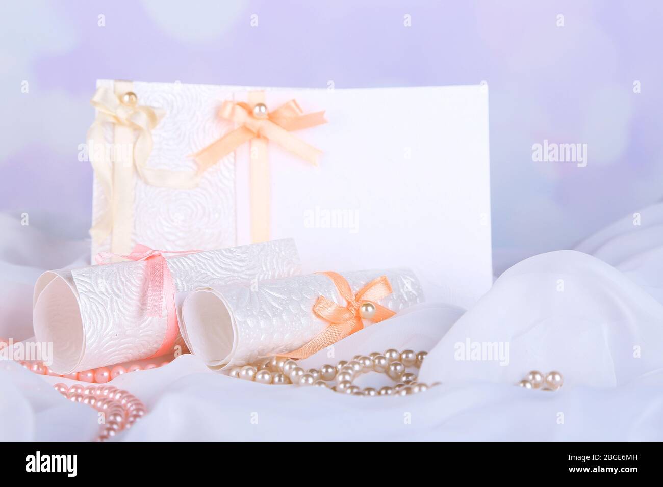 Beautiful handmade wedding cards on light background Stock Photo - Alamy