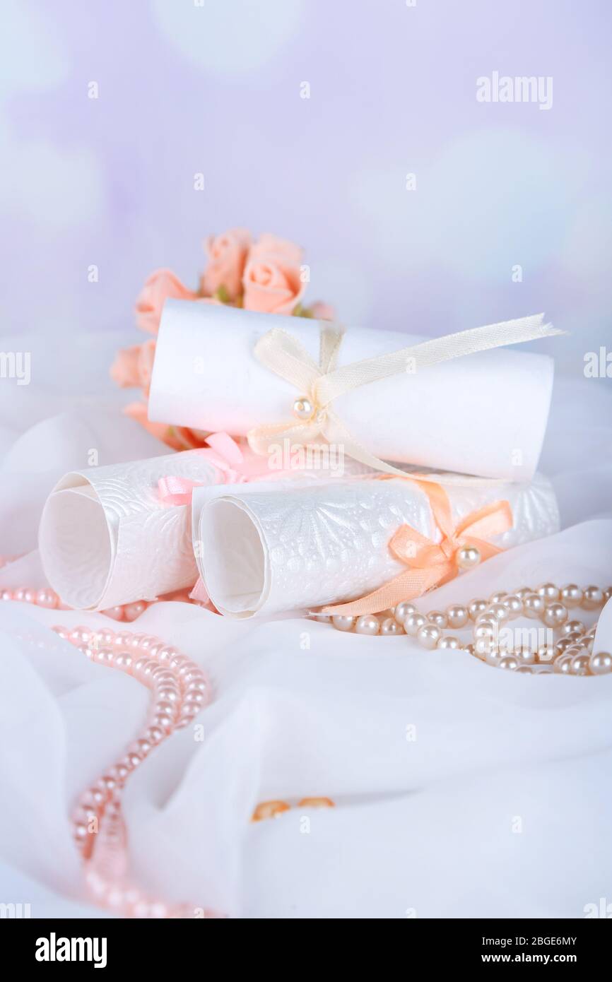 Beautiful handmade wedding cards on light background Stock Photo - Alamy