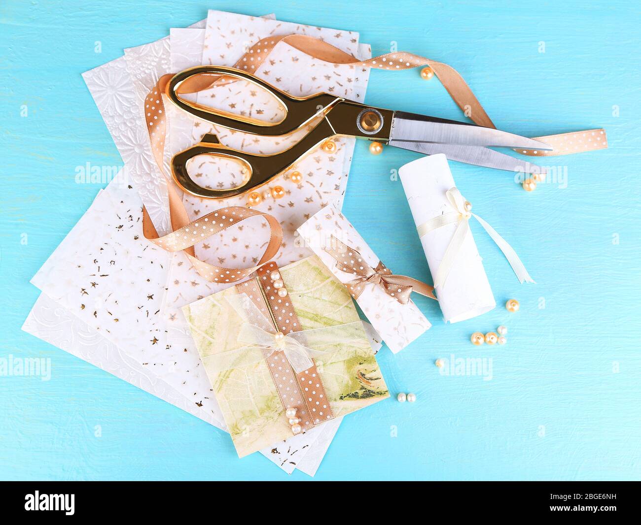 Beautiful handmade wedding cards on blue background Stock Photo - Alamy