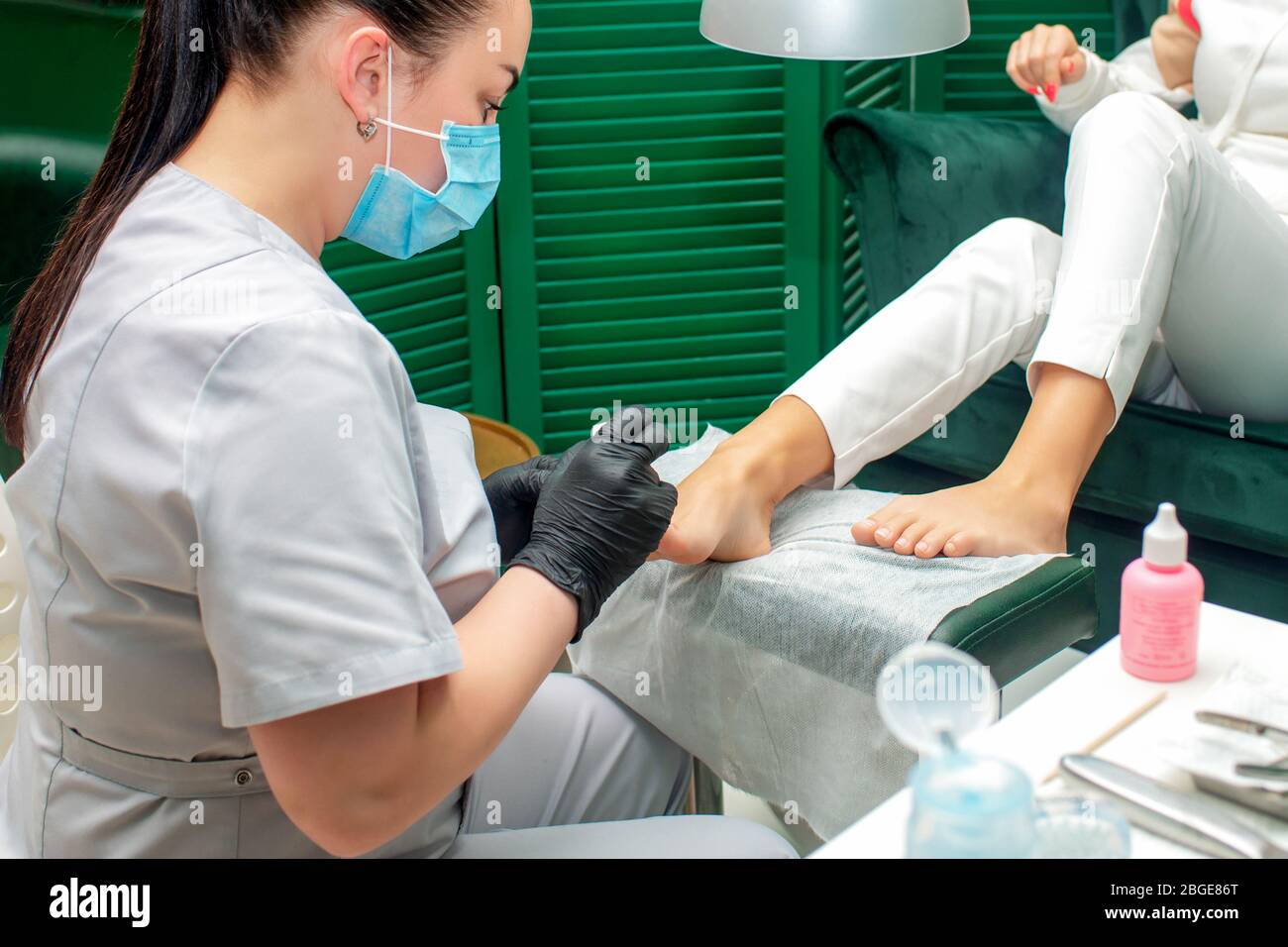 Woman receiving pedicure hi-res stock photography and images - Alamy