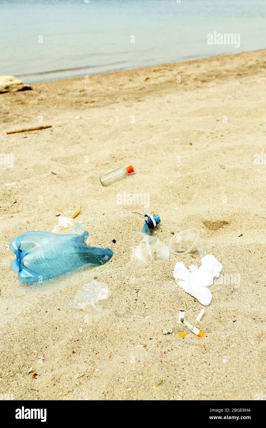 Garbage on the beach Stock Photo - Alamy