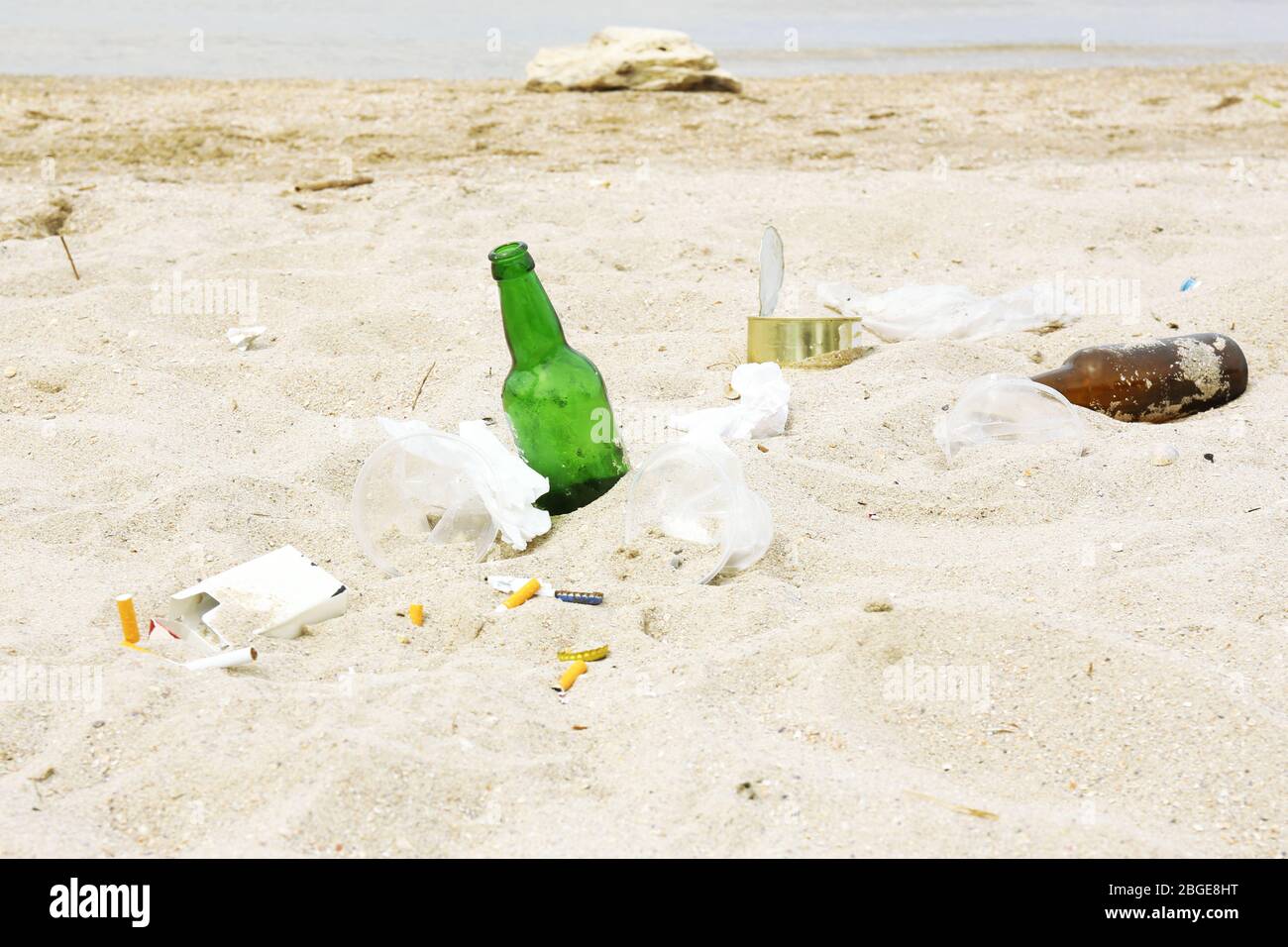 Garbage on the beach Stock Photo - Alamy