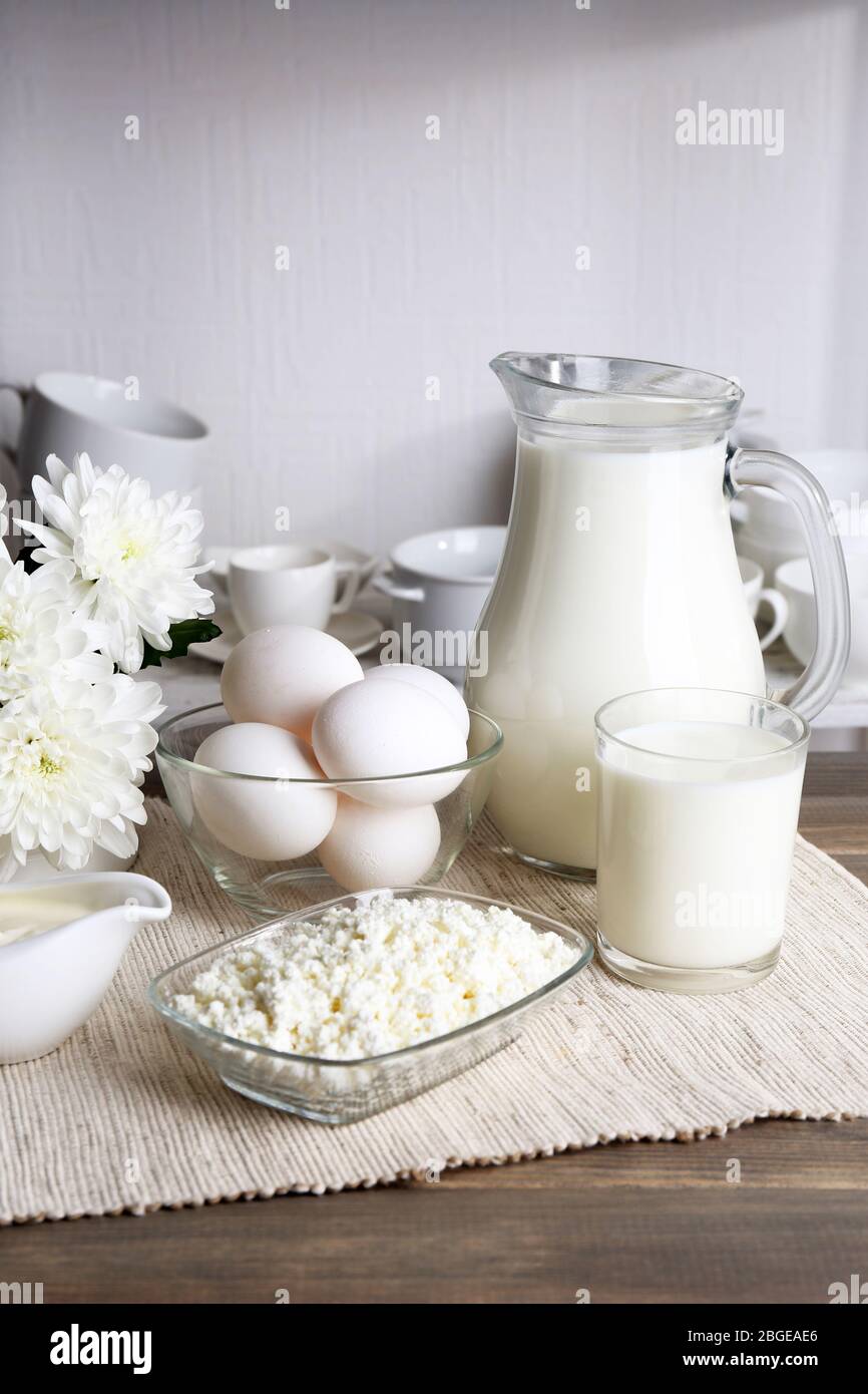 Still life with tasty dairy products on table Stock Photo - Alamy