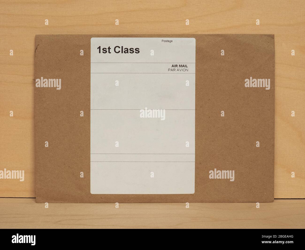 First class air mail letter envelope with blank label Stock Photo - Alamy