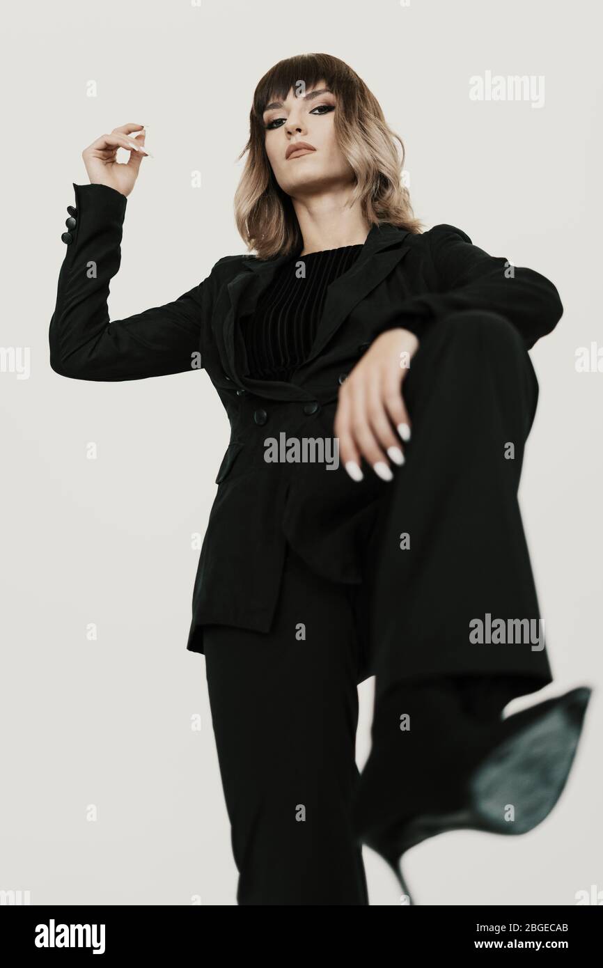 Portrait beautiful bossy woman with attitude wearing black clothes ...