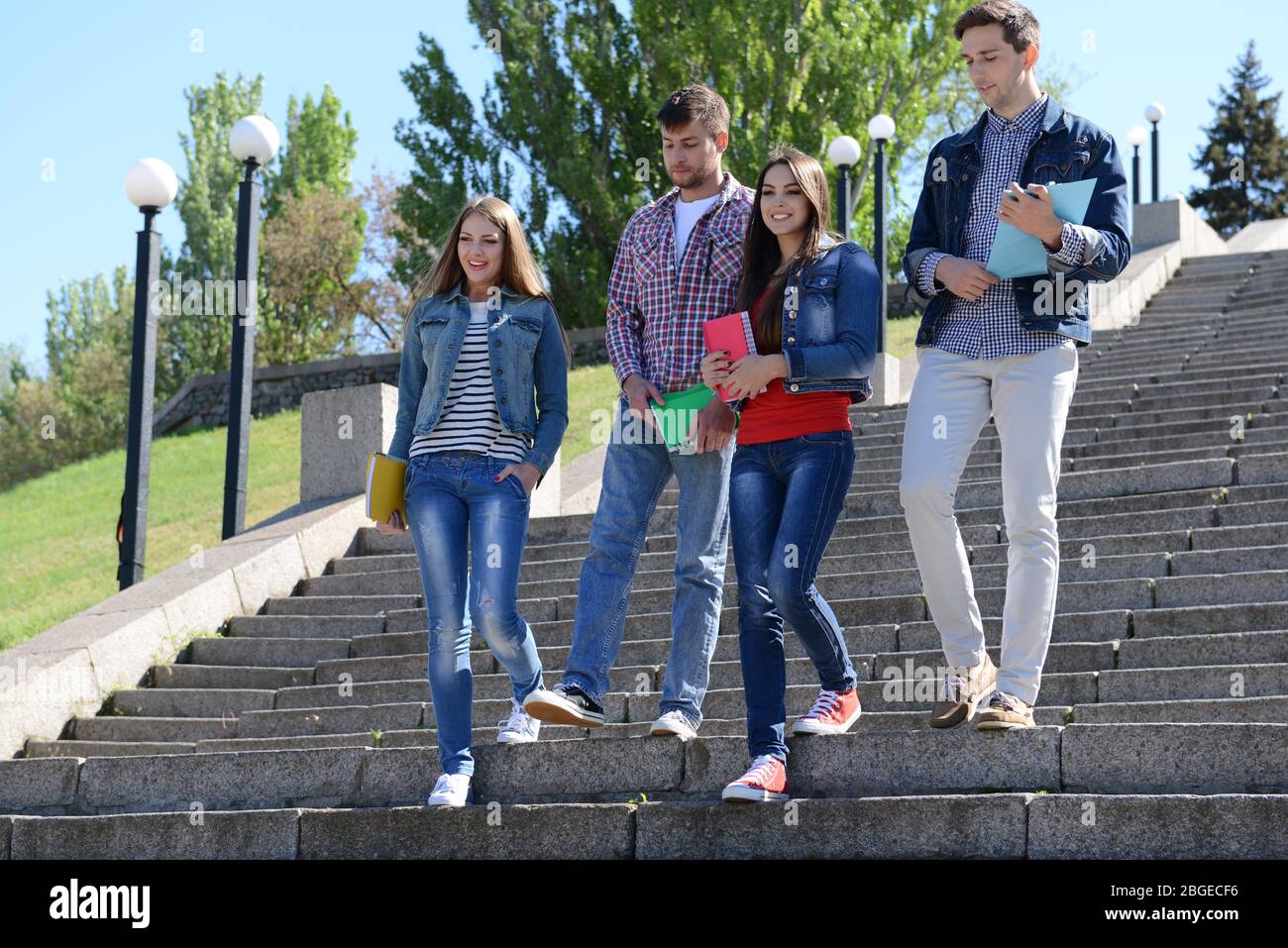 College students stand on hi-res stock photography and images - Alamy