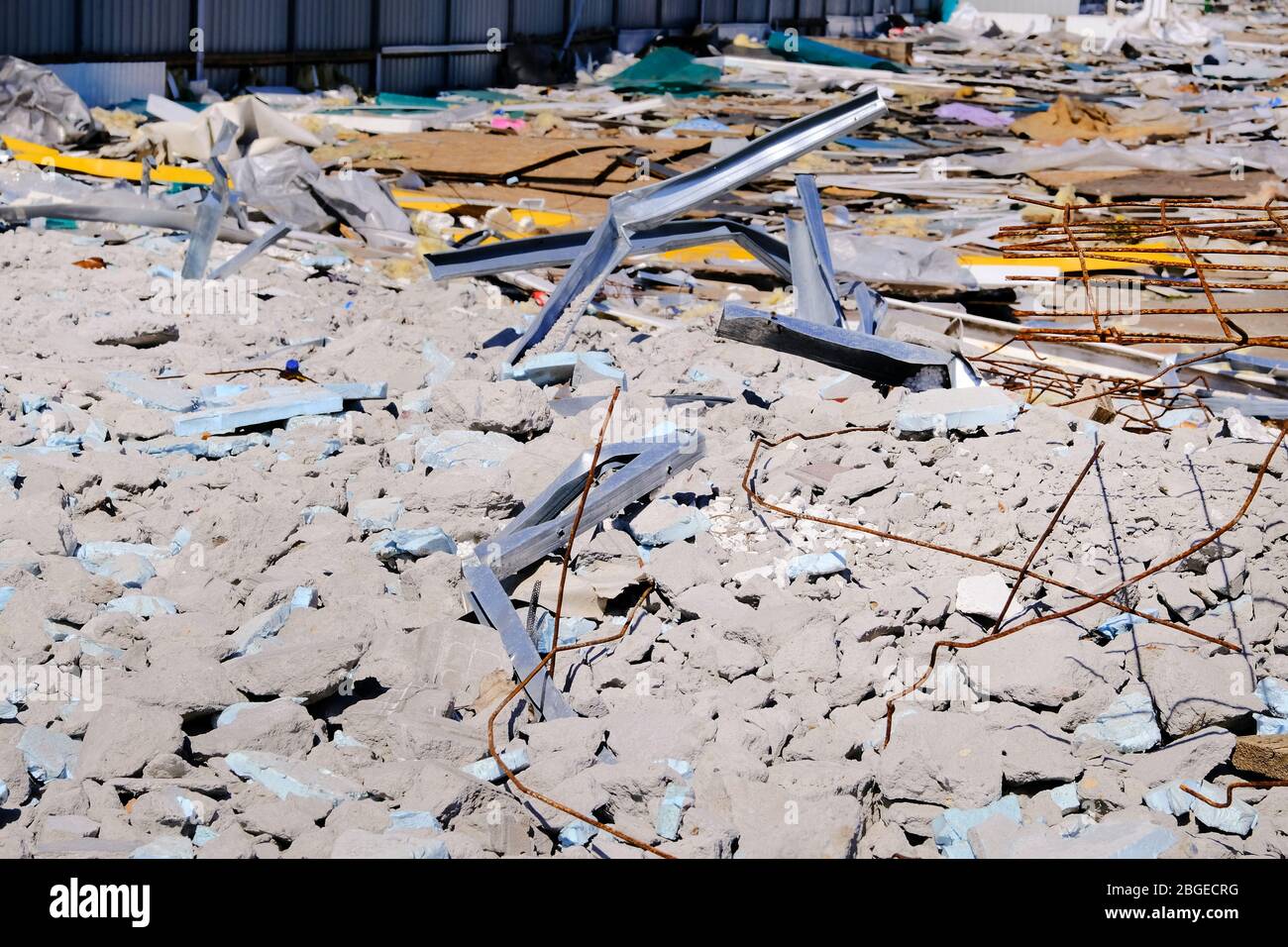 Construction waste, cardboard, plywood, fittings after destruction of ...