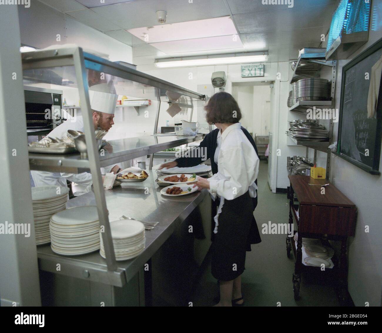 Kitchen staff in a 1990s restaurant hi-res stock photography and images ...