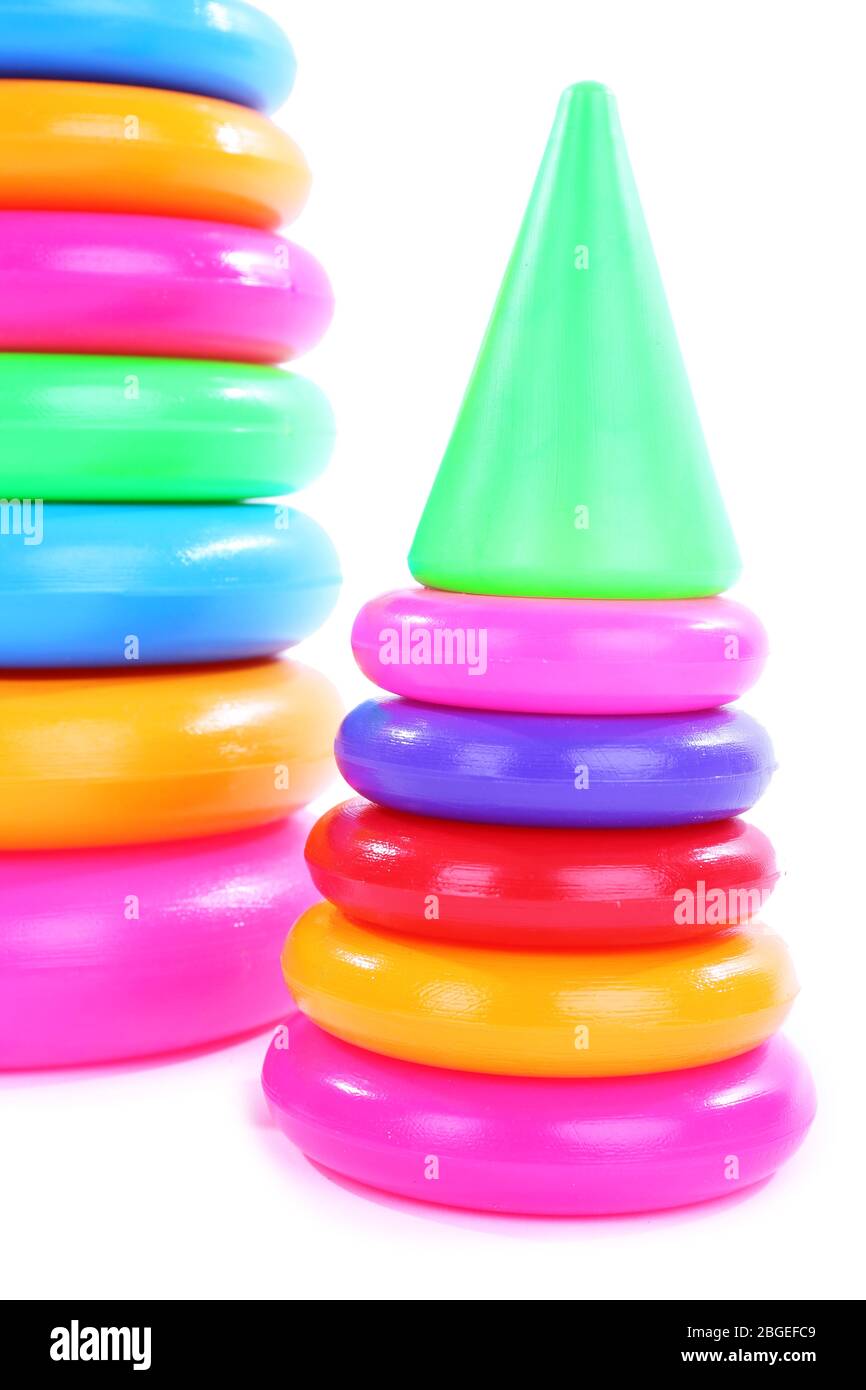 Plastic toy pyramids isolated on white Stock Photo - Alamy