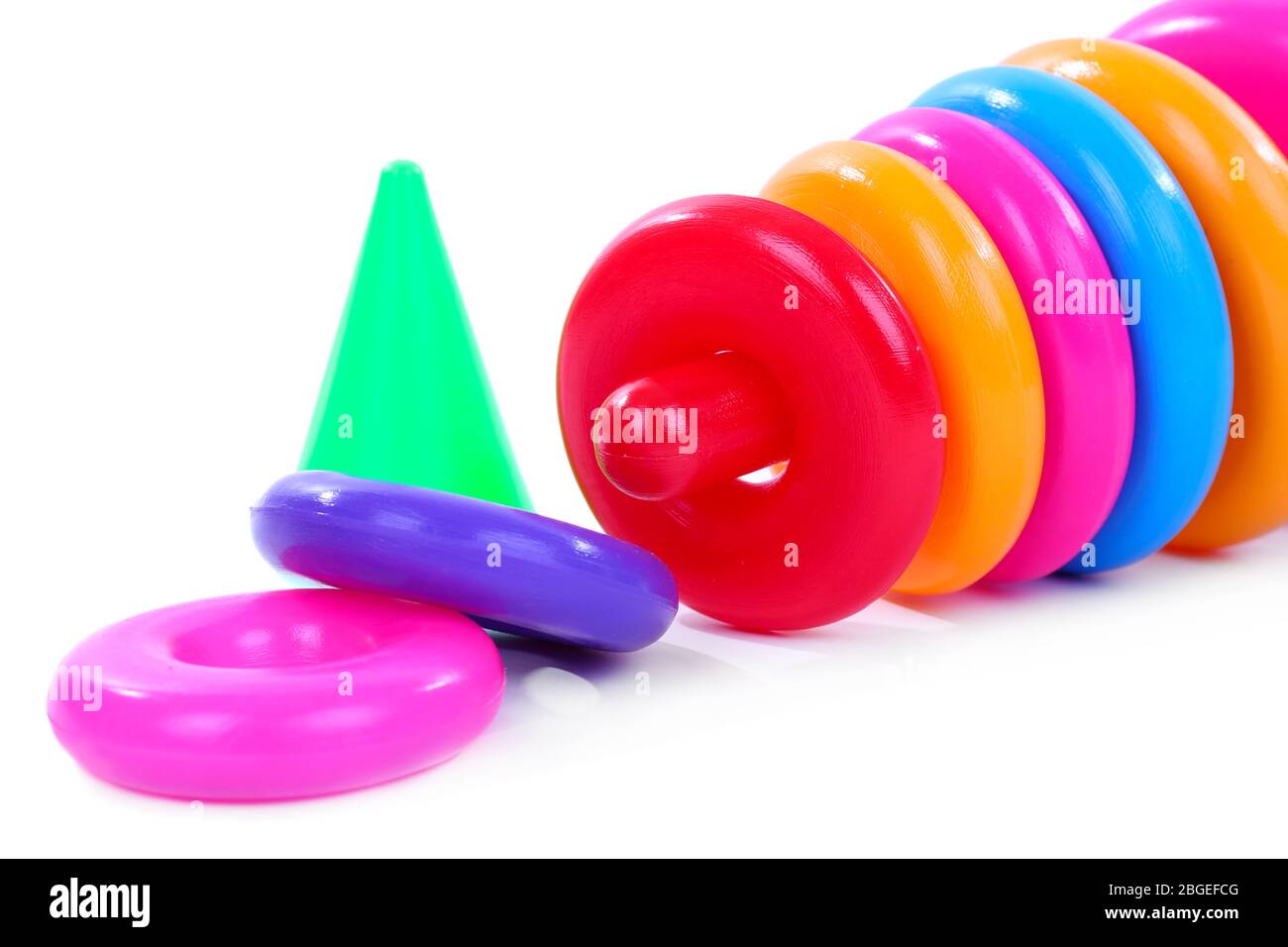 Plastic toy pyramid isolated on white Stock Photo - Alamy