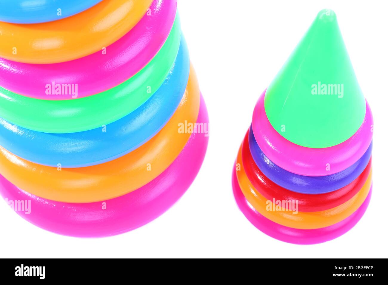 Plastic toy pyramids isolated on white Stock Photo - Alamy