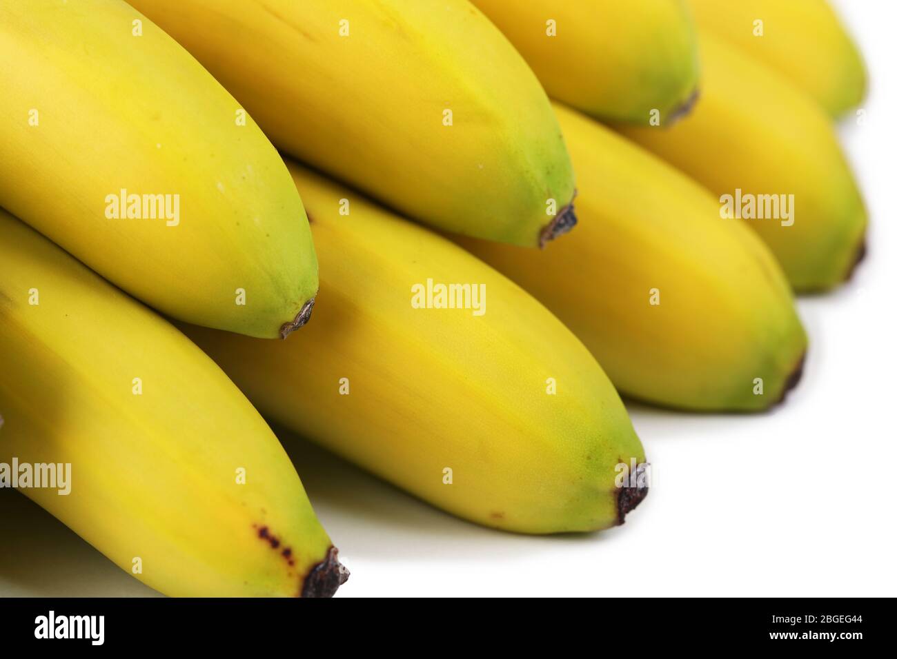 Bunch of mini bananas isolated on white Stock Photo - Alamy