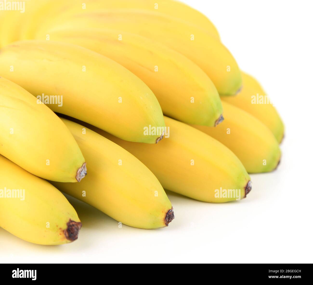 Bunch of mini bananas isolated on white Stock Photo - Alamy