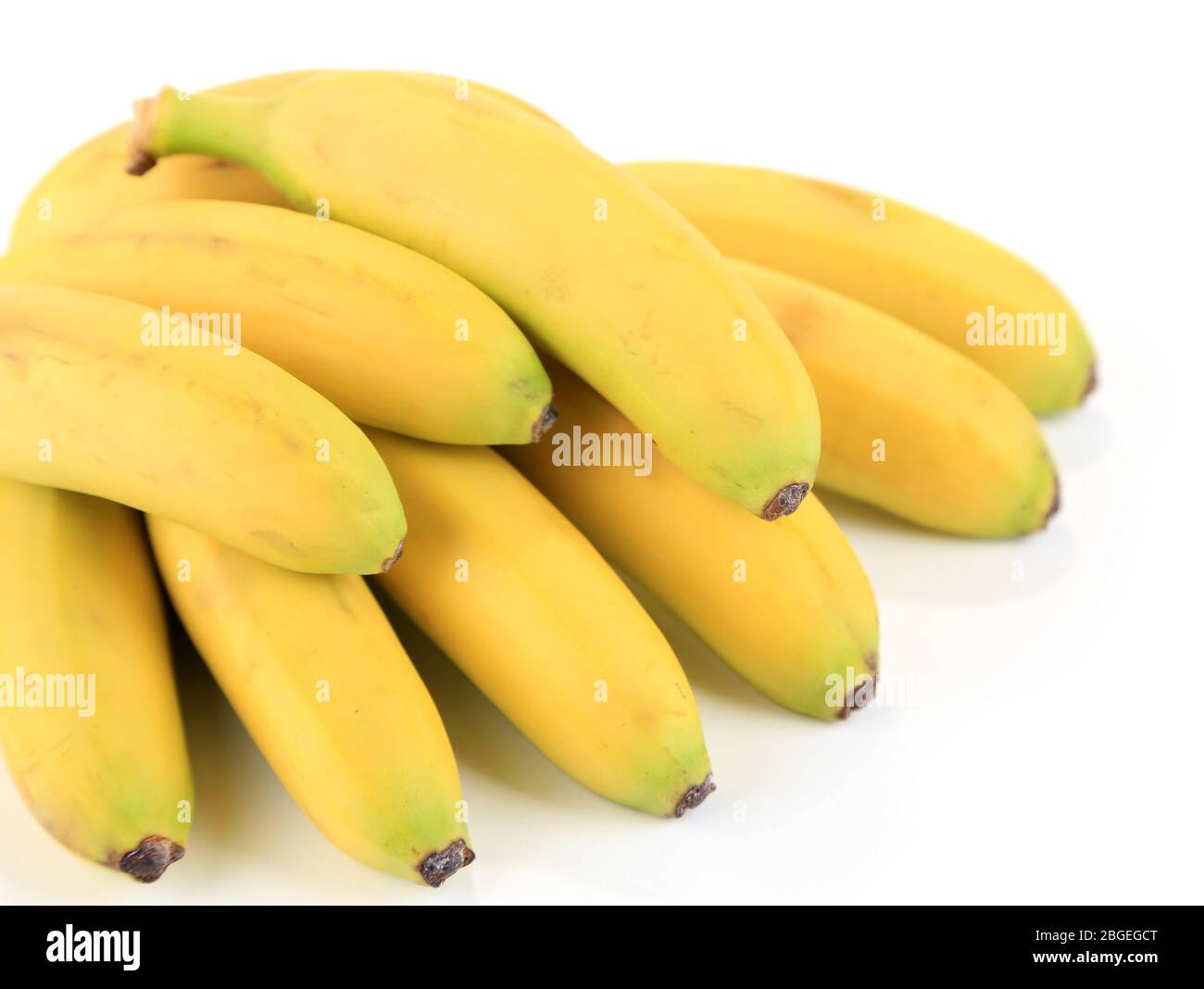 Bunch of mini bananas isolated on white Stock Photo - Alamy