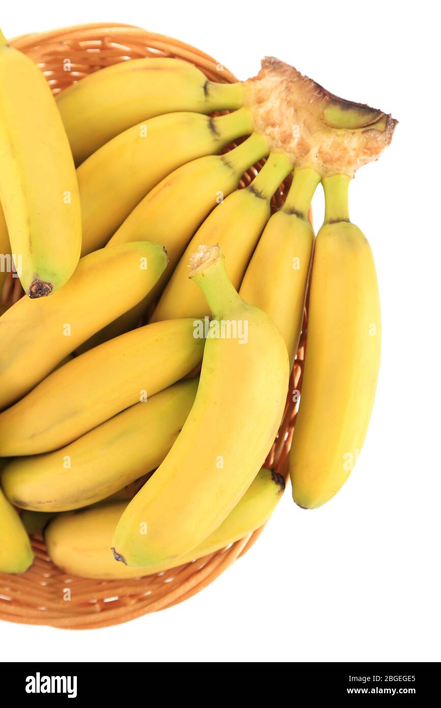 Bunch of mini bananas in wicker basket isolated on white Stock Photo ...
