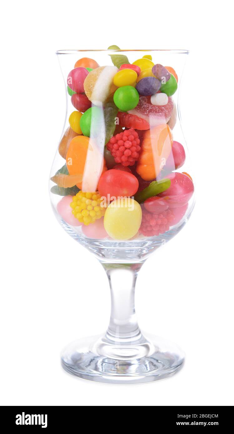 Different colorful fruit candy in glass isolated on white Stock Photo ...
