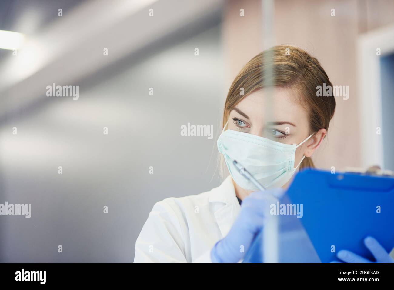 Doctor doing routine control in the hospital room Stock Photo - Alamy