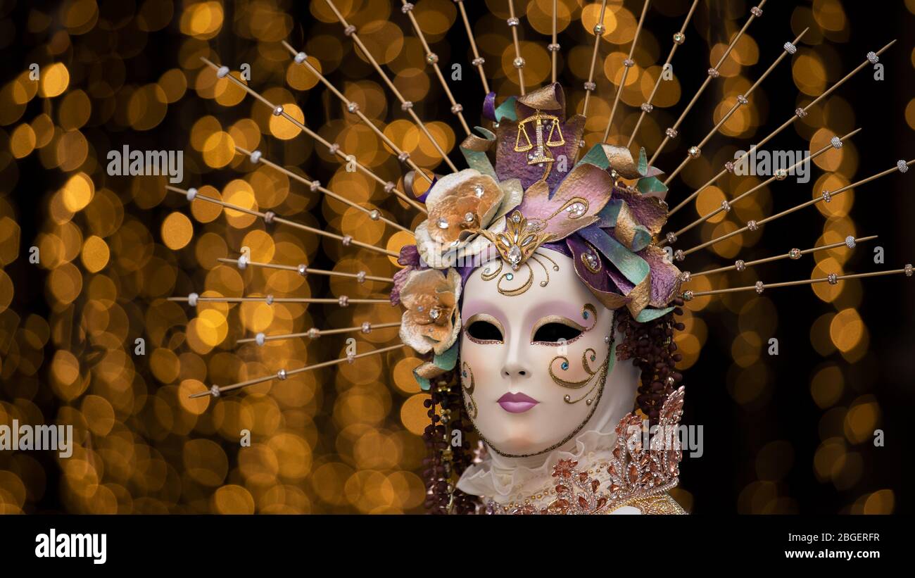 Reveller In Traditional Elaborate Mask And Costume At The Annual Venice ...