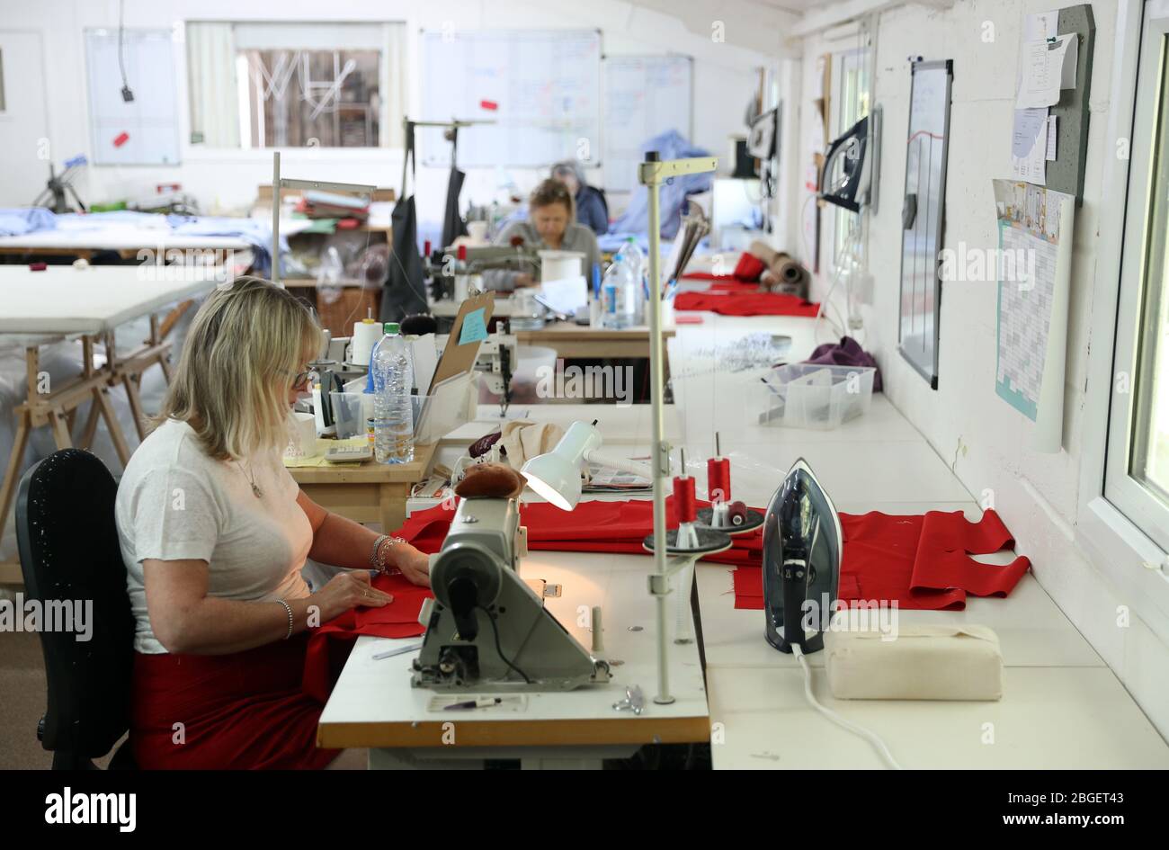 A member of the Hursley Workroom near Winchester sews together pieces ...