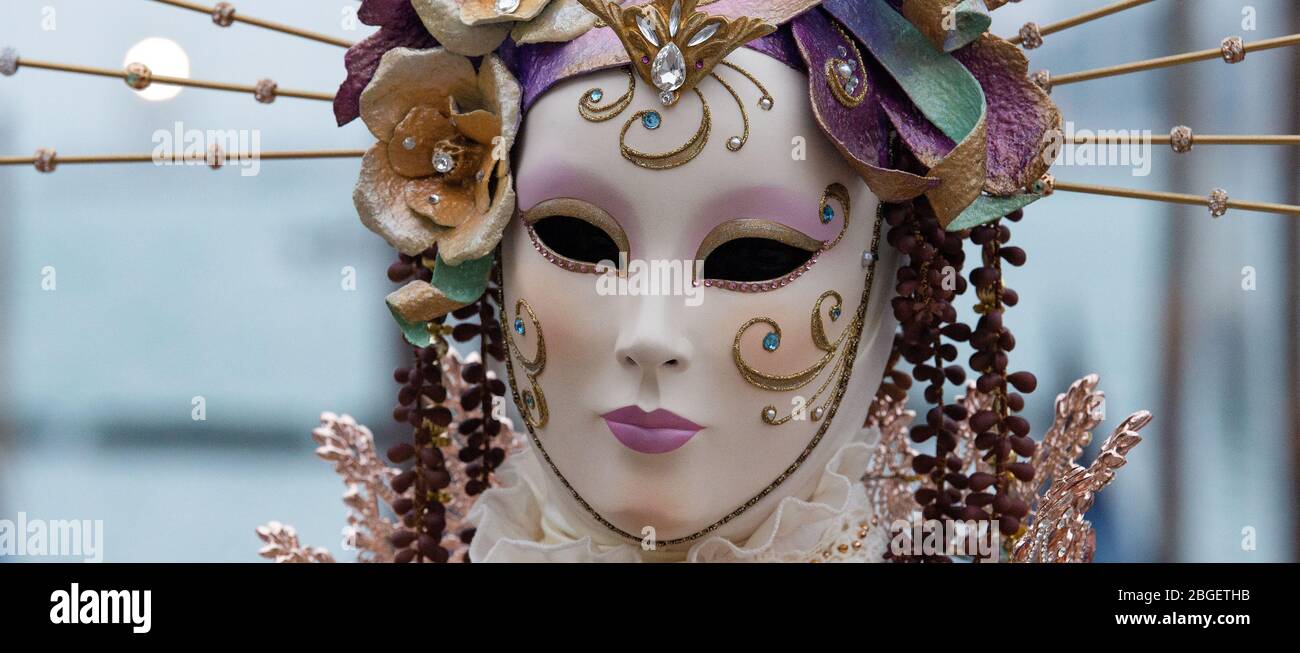 Reveller In Traditional Elaborate Mask And Costume At The Annual Venice ...