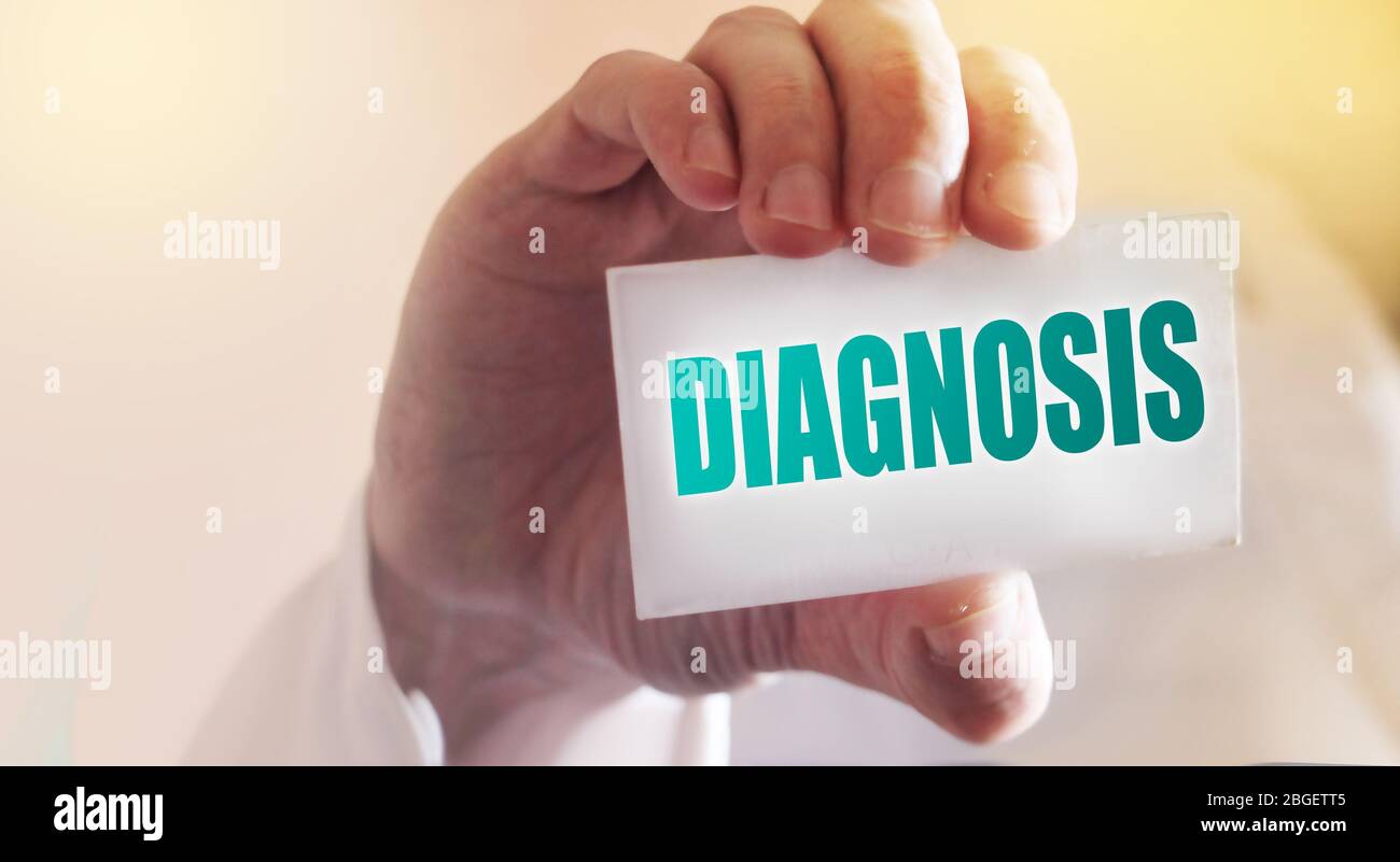 Diagnosis word on a card Doctor is holding. Right diagnostic medical ...
