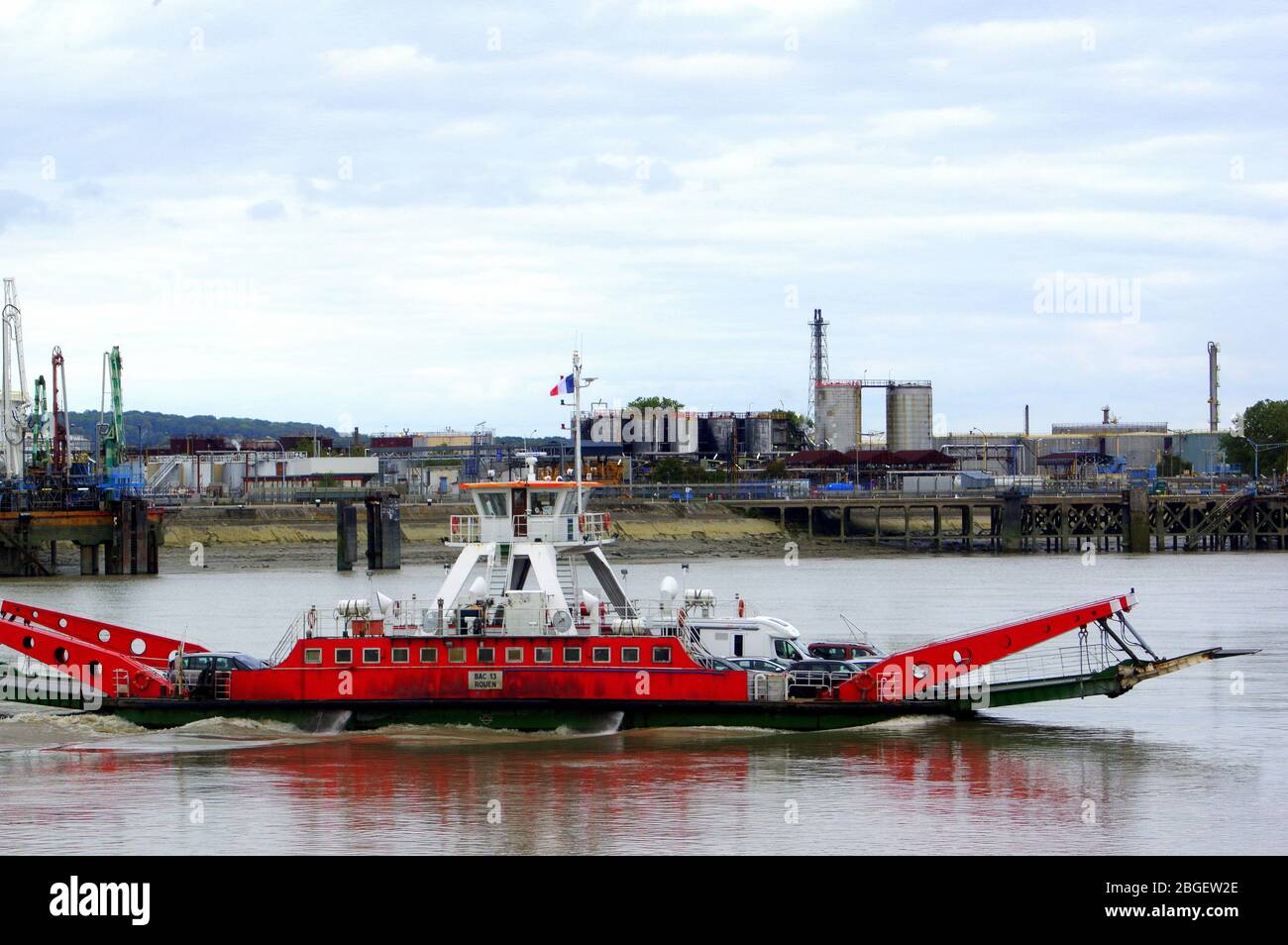 Red ferry crossing the river Stock Photo - Alamy