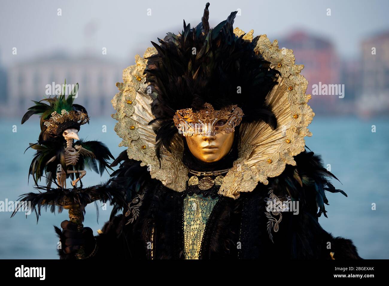 Reveller In Traditional Elaborate Mask And Costume At The Annual Venice ...