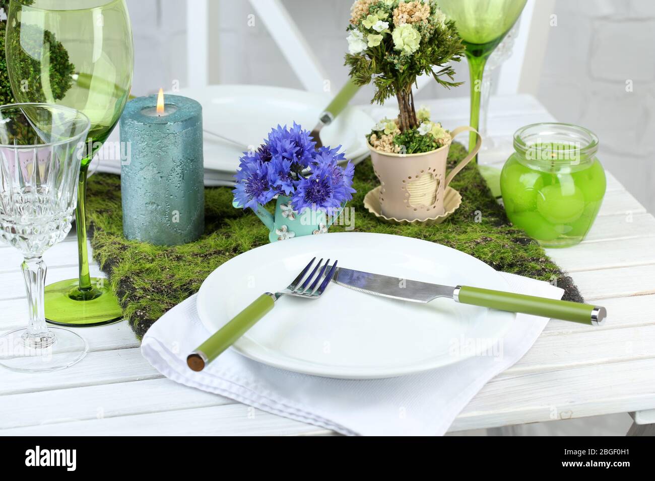 Trendy table setting in restaurant Stock Photo - Alamy