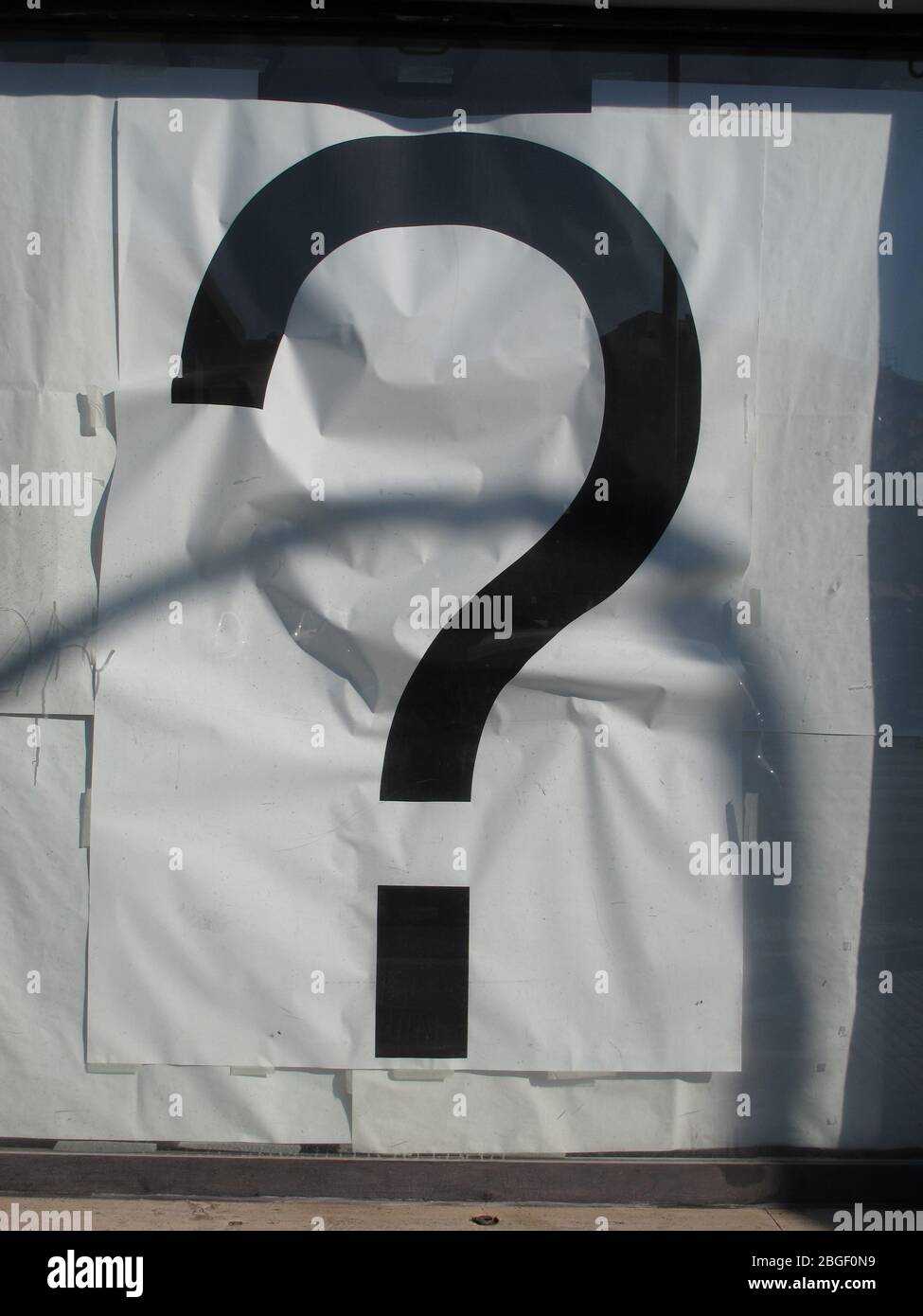Question Mark symbol on shop front in rome italy Stock Photo - Alamy