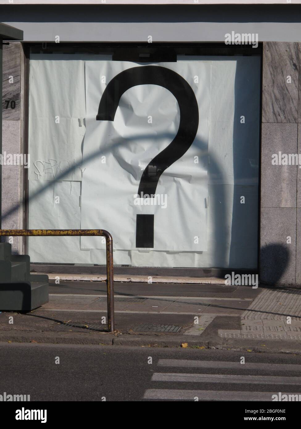 Question Mark symbol on shop front in rome italy Stock Photo - Alamy
