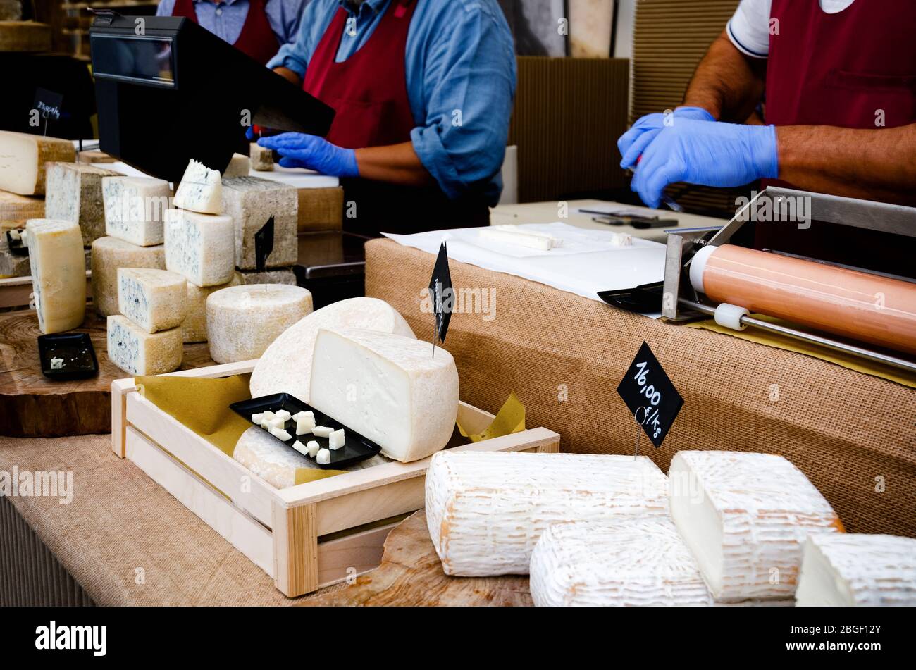 traditional hard cheese on a market stall in Italy Stock Photo - Alamy