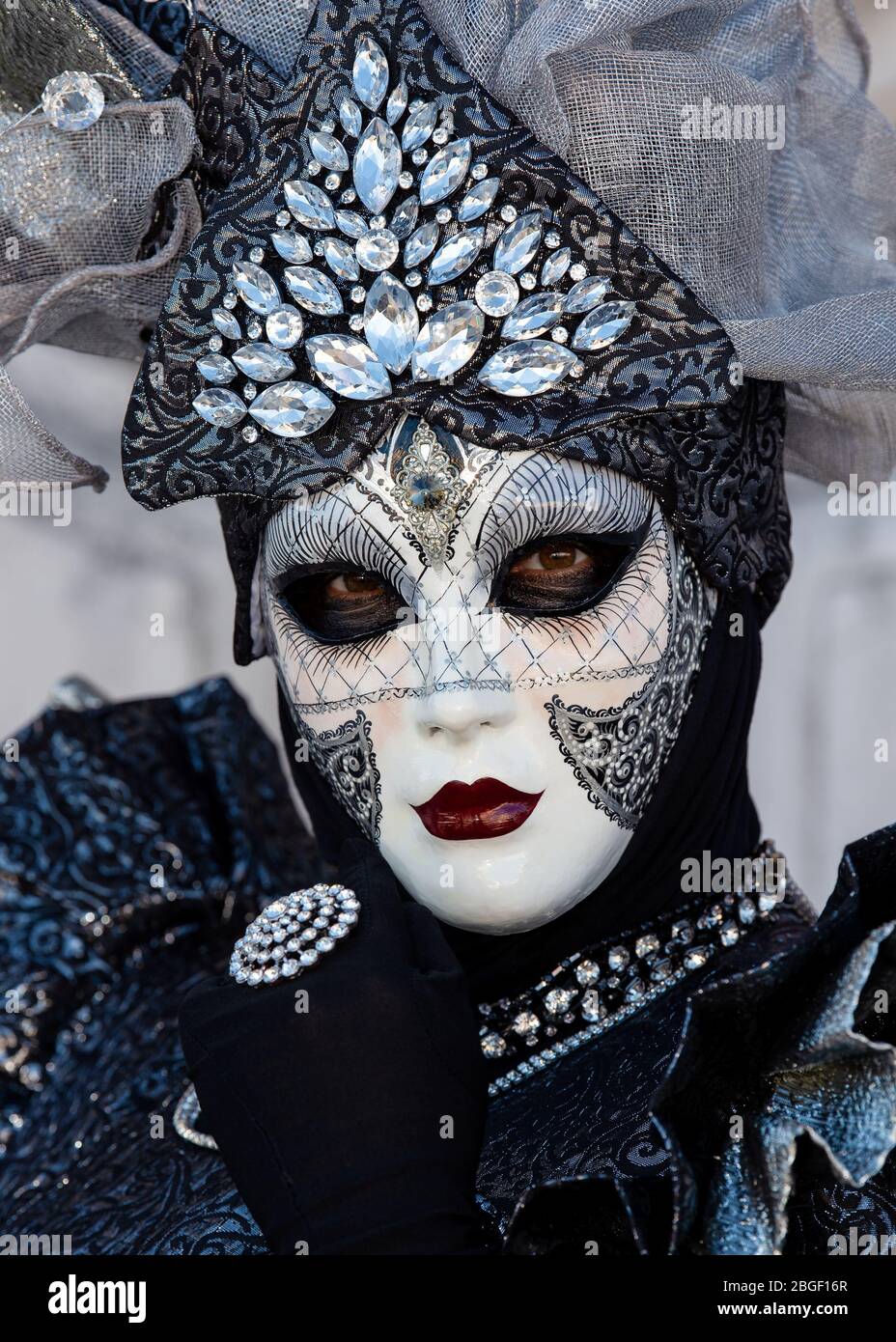 Reveller In Traditional Elaborate Mask And Costume At The Annual Venice ...