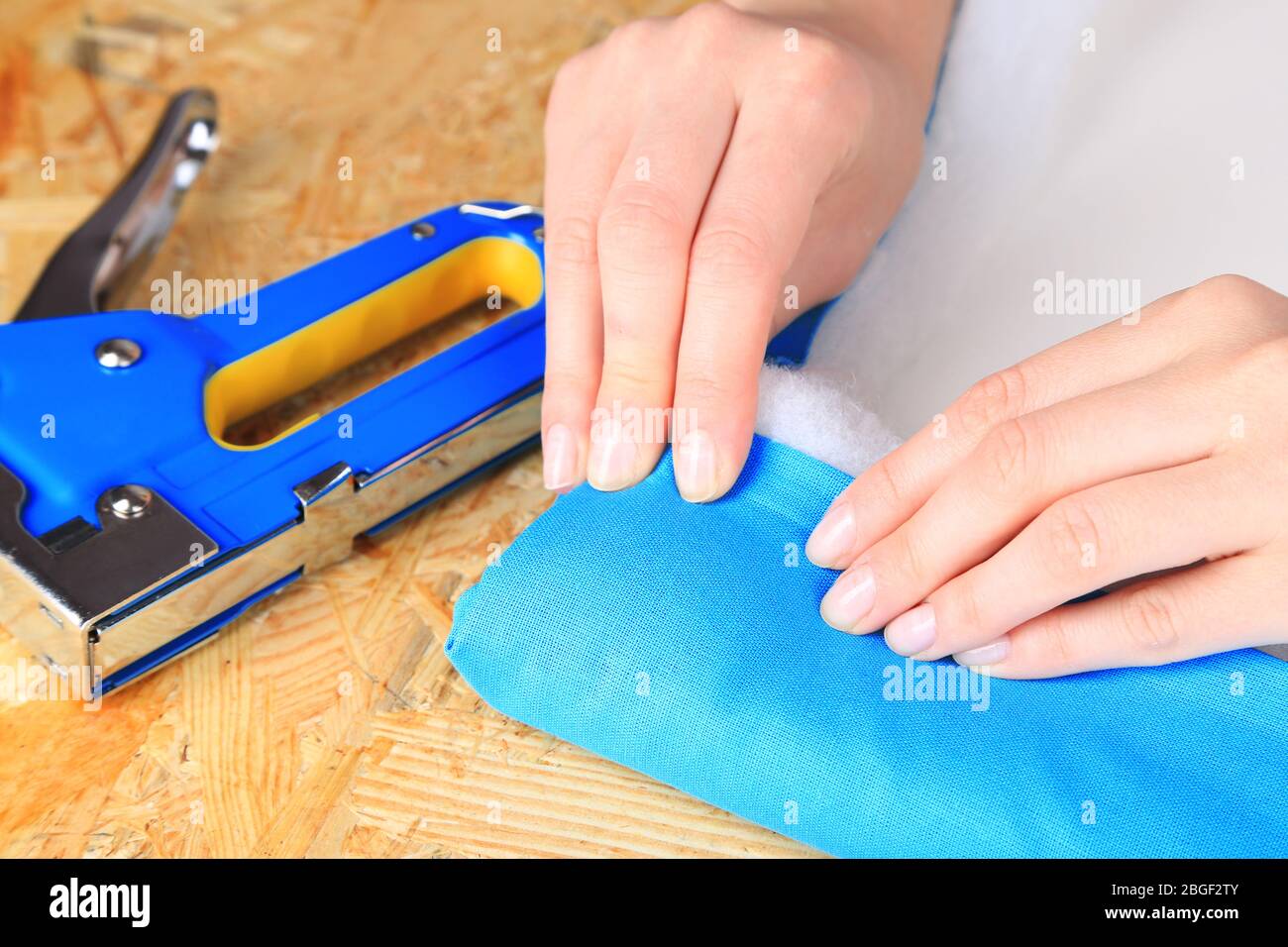 Female hand construction stapler hi-res stock photography and images ...