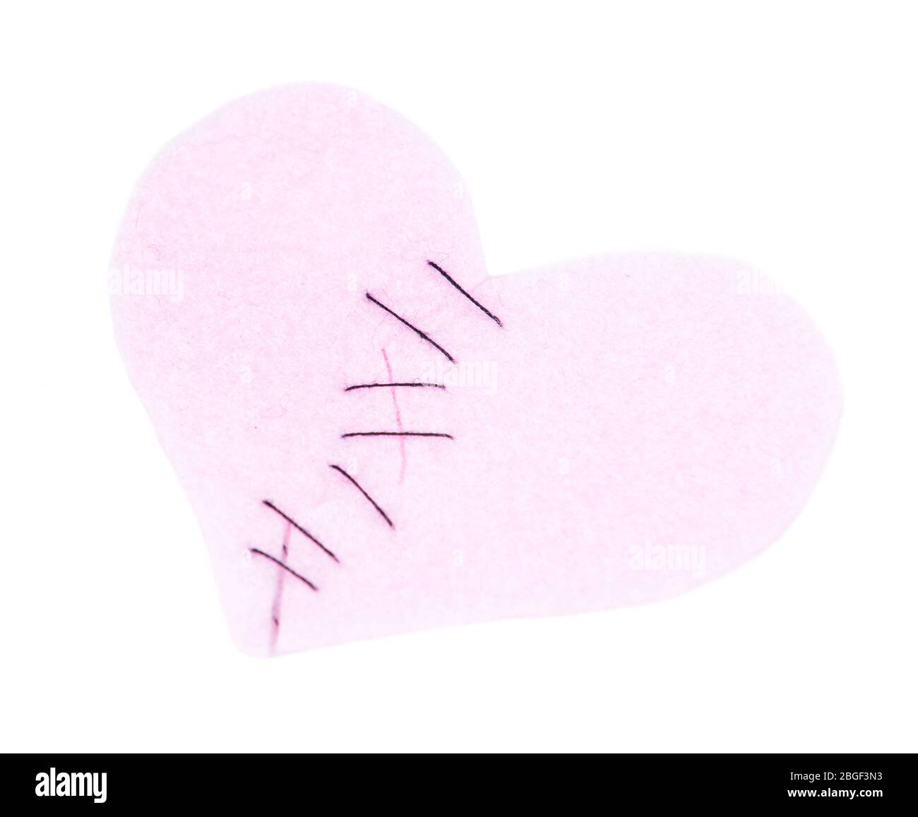 Broken heart and thread isolated on white Stock Photo - Alamy