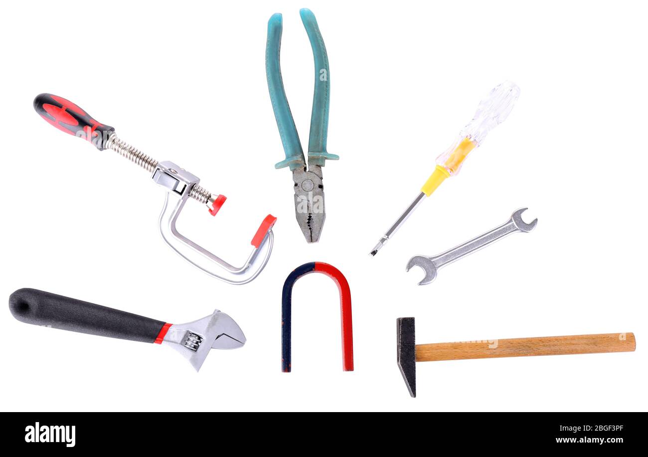 Composition of magnet and tools isolated on white Stock Photo - Alamy