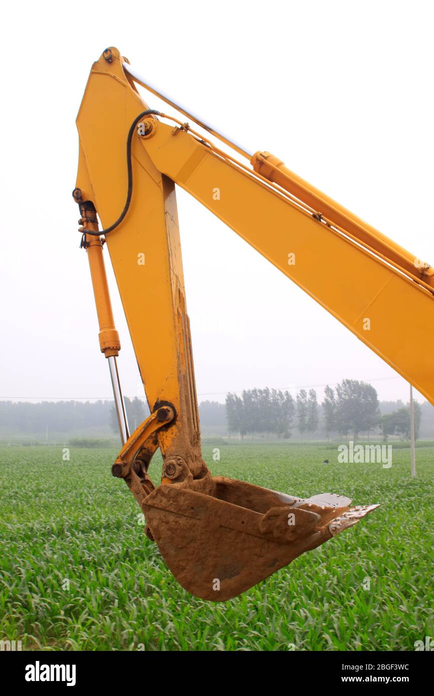 excavator in the construction site Stock Photo - Alamy