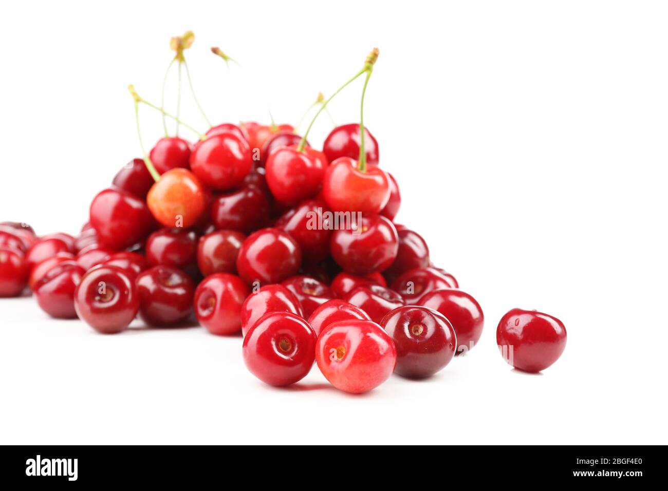 Sweet cherries isolated on white Stock Photo - Alamy