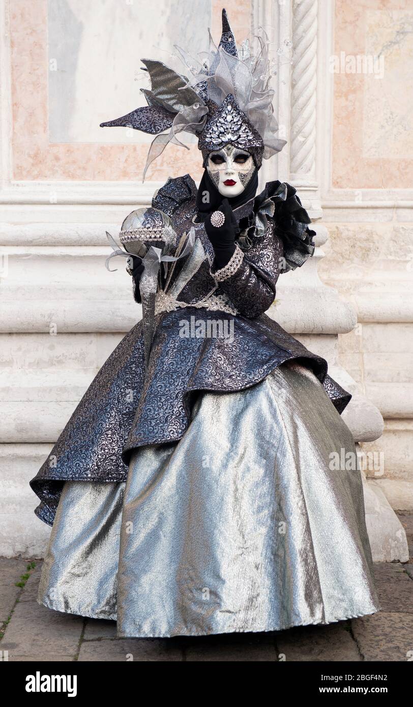 Reveller In Traditional Elaborate Mask And Costume At The Annual Venice ...